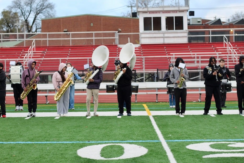 "Horns Up," As Marching Governors Hit The Field